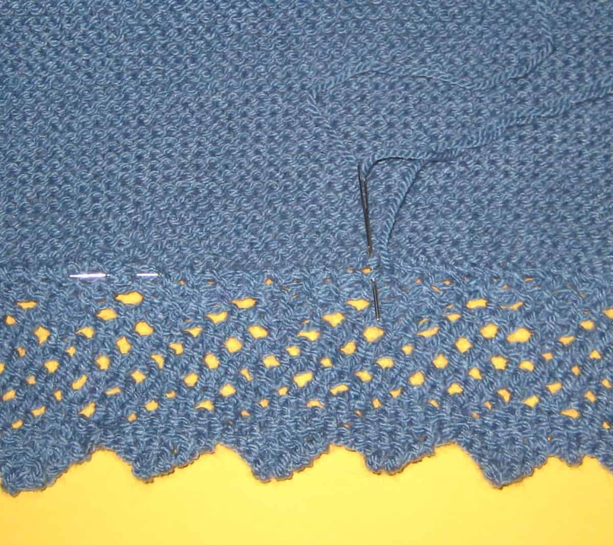 Cómo tejer una bufanda con dos agujas